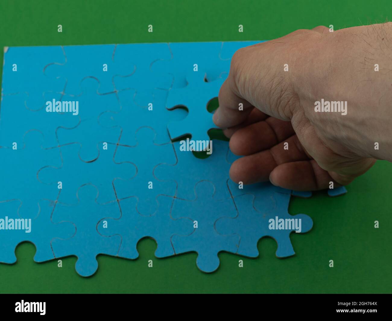 Colored puzzle pieces hi-res stock photography and images - Alamy