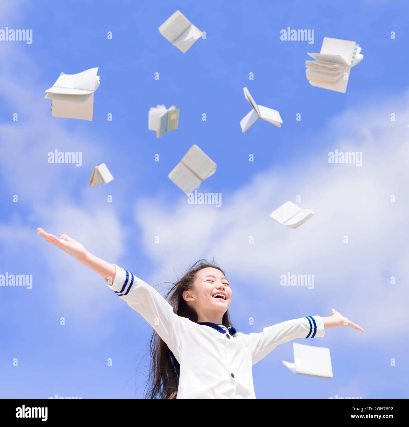 Book throw hi-res stock photography and images - Alamy