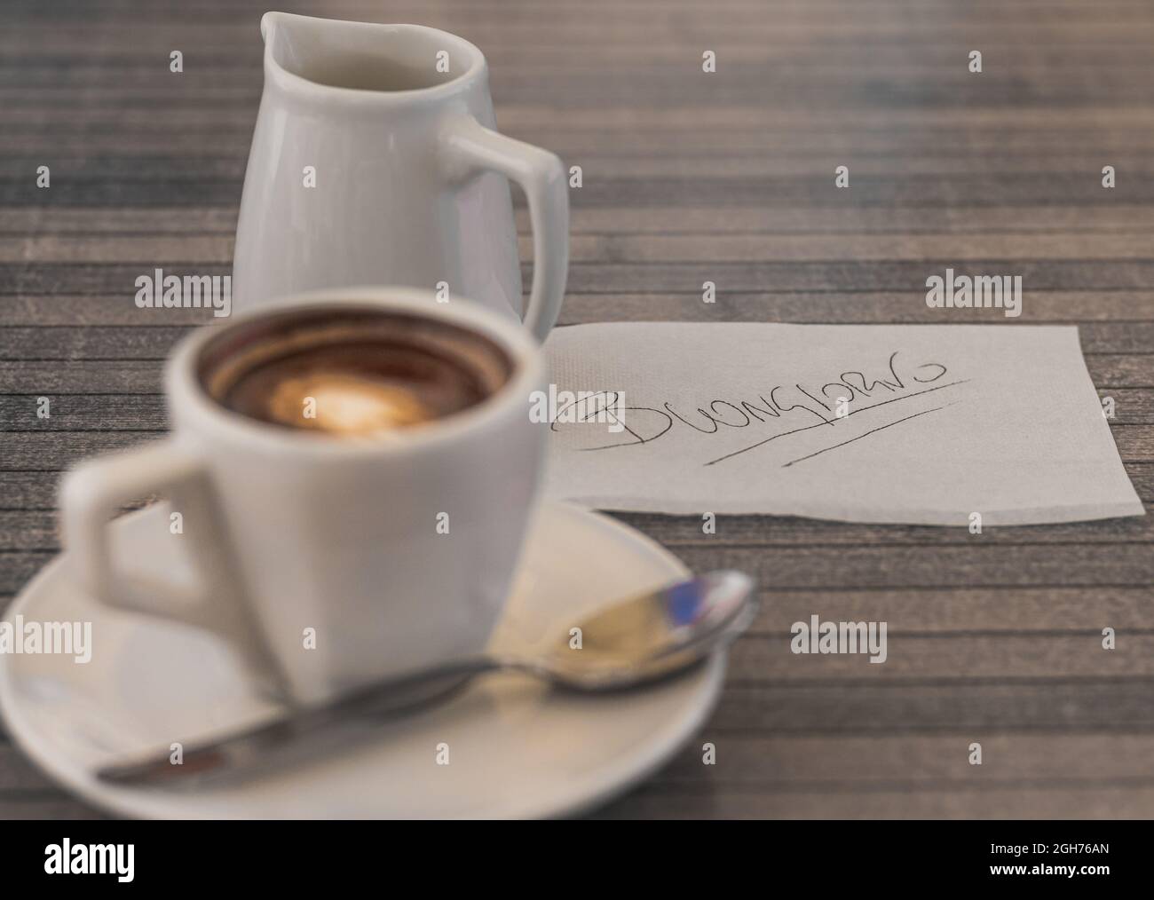 cup of coffee with inscription good morning in italian on background ...