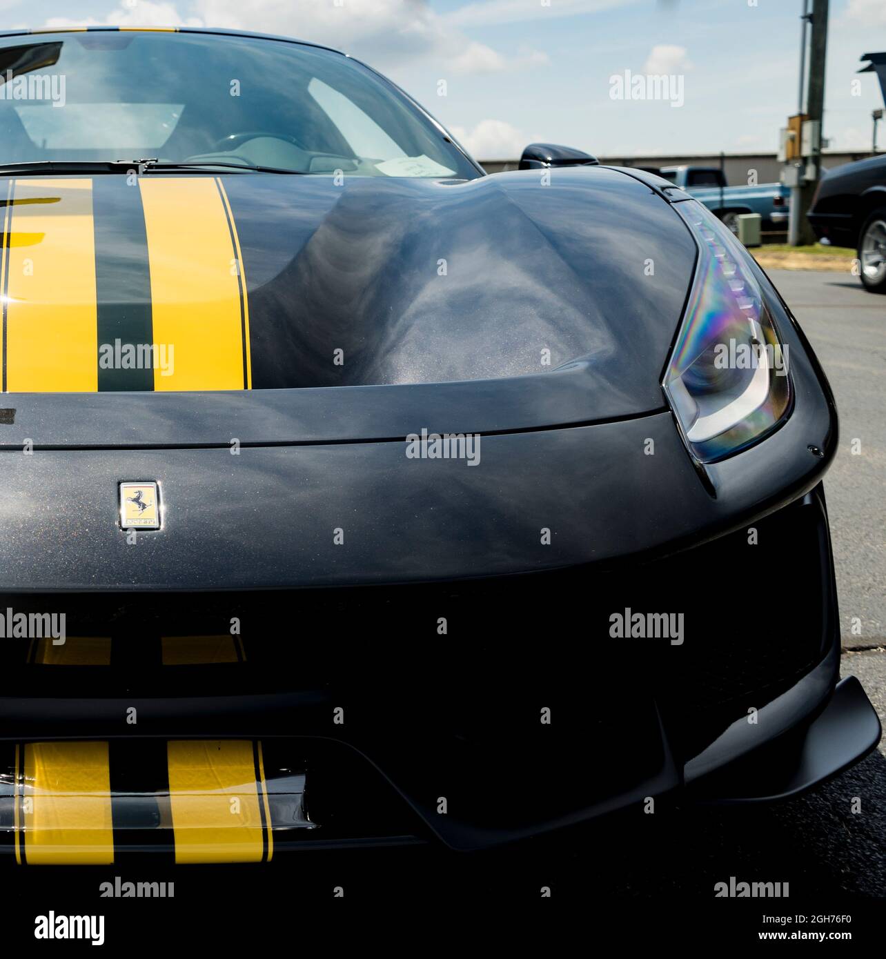 Franklin, Kentucky, USA - A black Ferrari with yellow racing stripes at ...