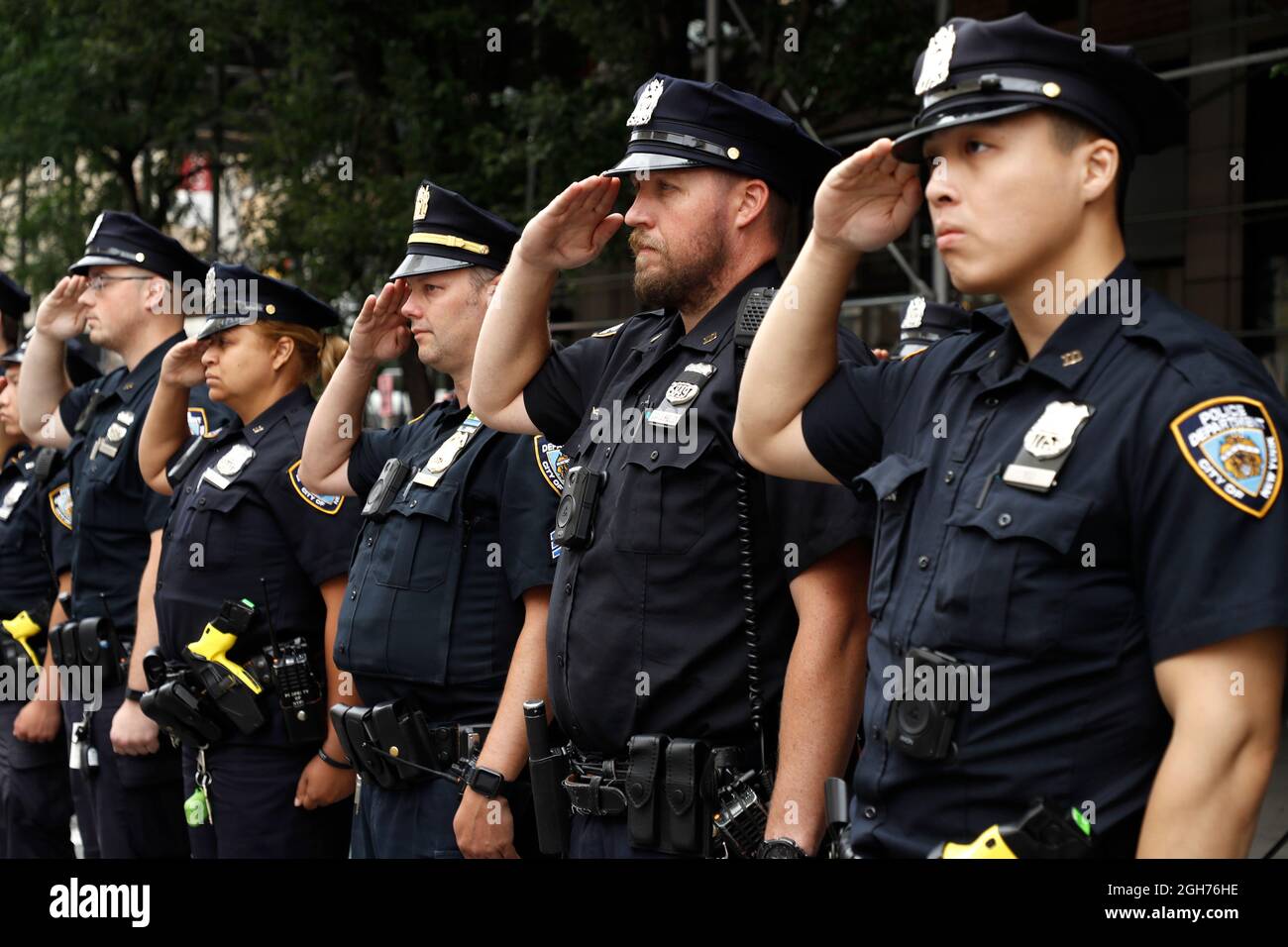 New York, United States. 05th Sep, 2021. Members of the NYPD salute ...