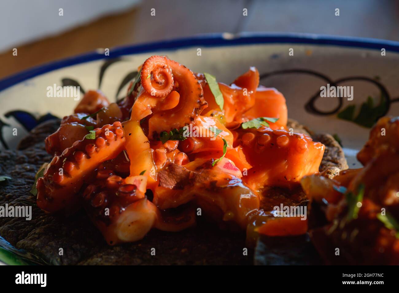 Octopus Ceviche on Blue Corn Tostadas, Mexican Seafood Dish Stock Photo ...