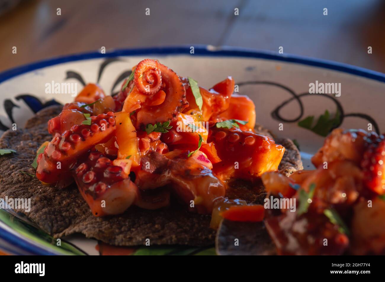 Octopus Ceviche on Blue Corn Tostadas, Mexican Seafood Dish Stock Photo ...