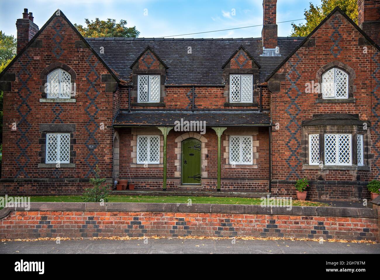 Old, vintage block of red brick houses in town of Sandbach ...