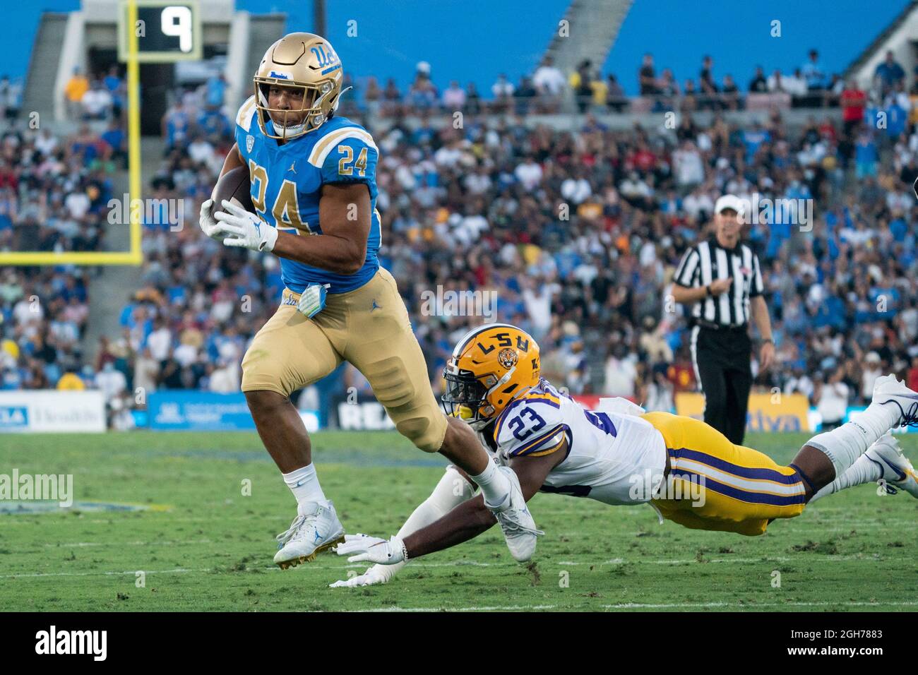 LSU Tigers linebacker Micah Baskerville (23) can’t catch UCLA Bruins ...