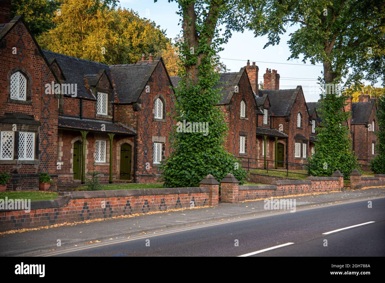 Old, vintage block of red brick houses in town of Sandbach ...