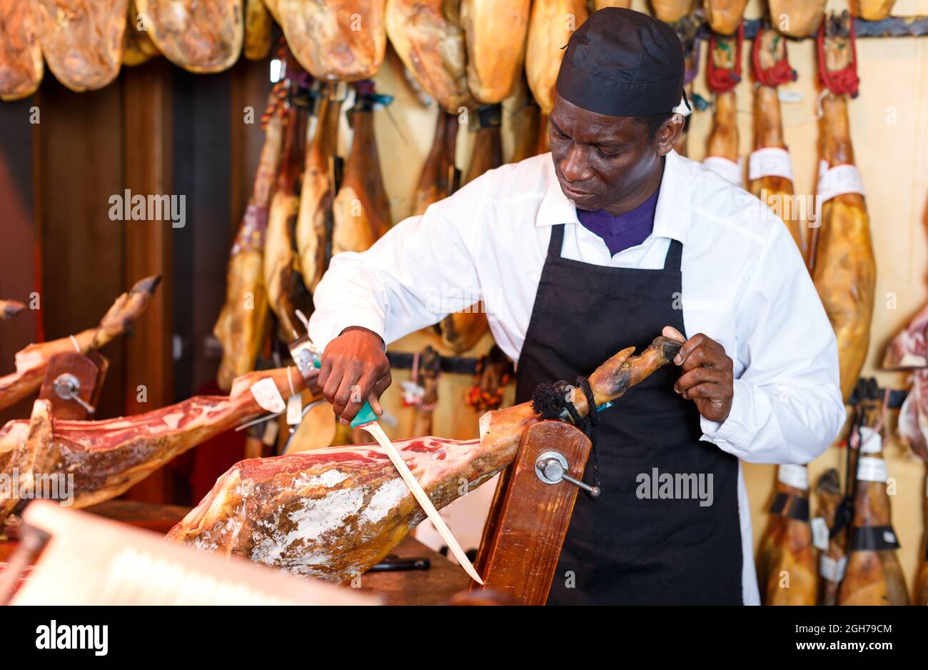 Stand cutting meat jamon hi-res stock photography and images - Alamy