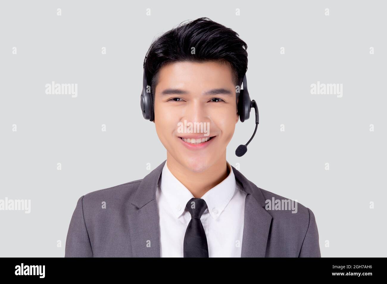 Portrait young asian business man call center wearing headset isolated ...