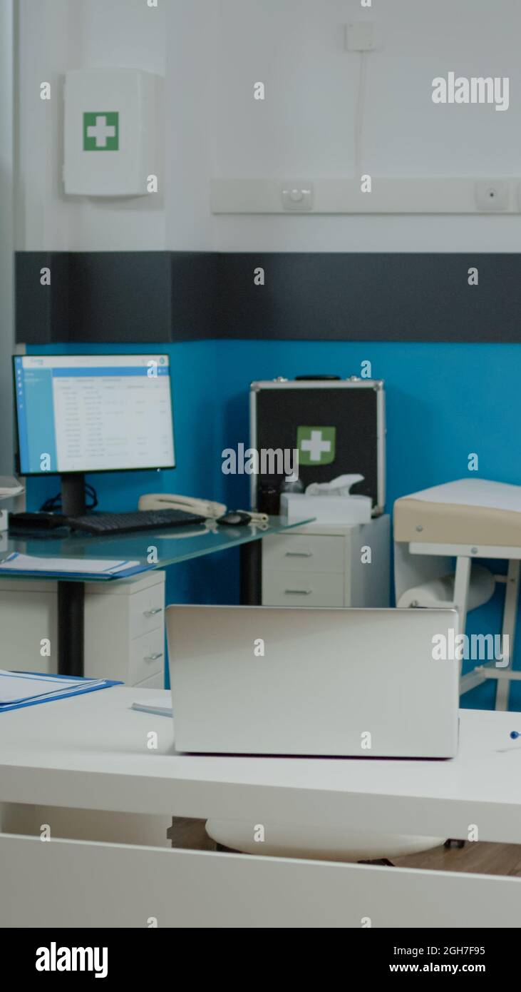 Empty doctors office with medical instruments at facility for ...