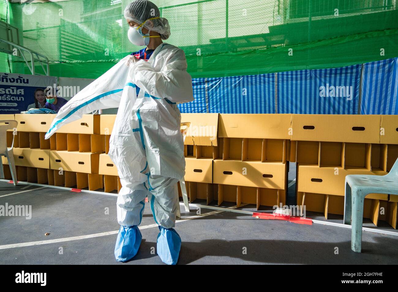 Volunteers working at a COVID testing centre providing free tests for ...