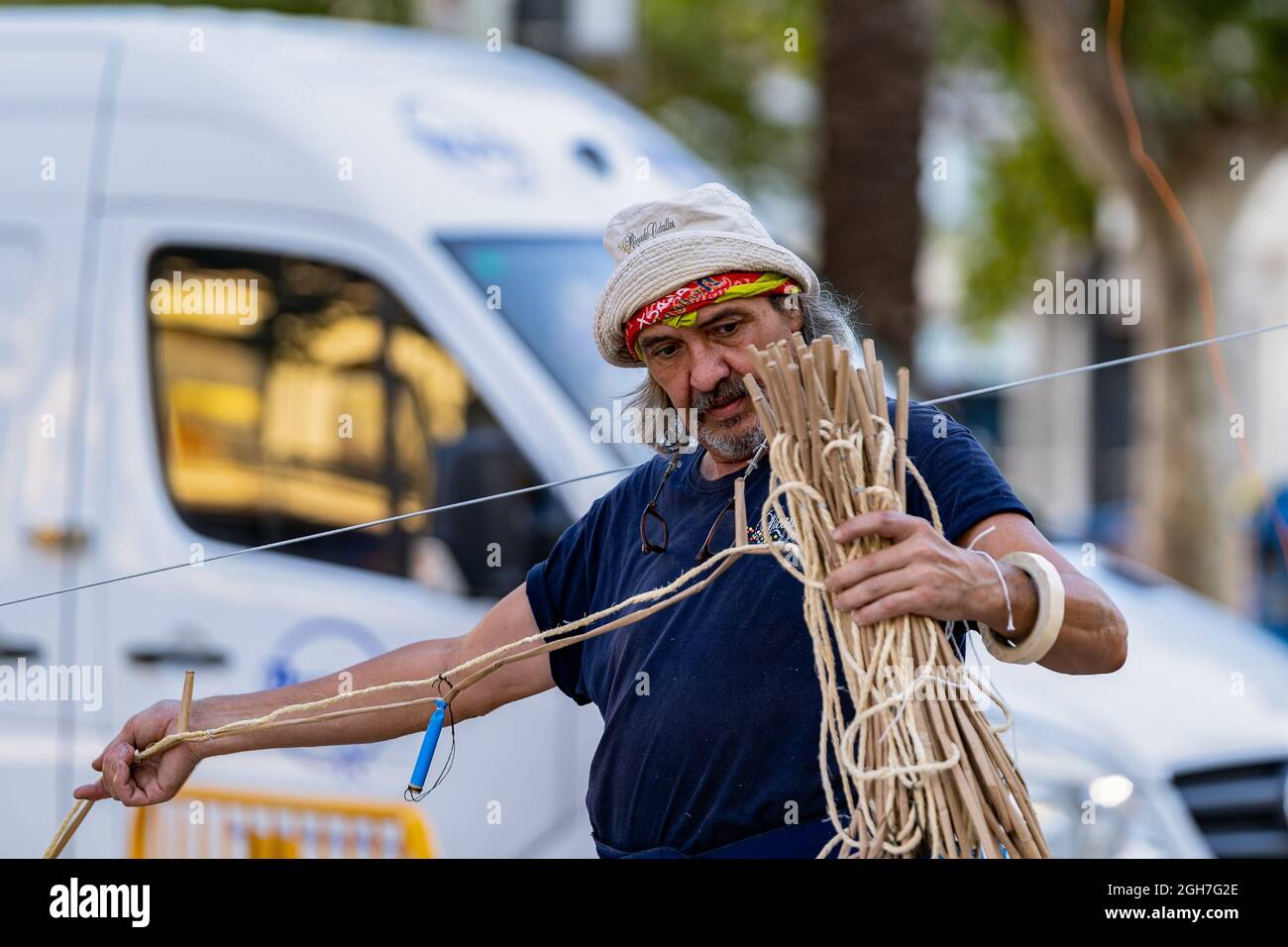 A pyrotechnician prepares fireworks around the municipal Falla at the ...