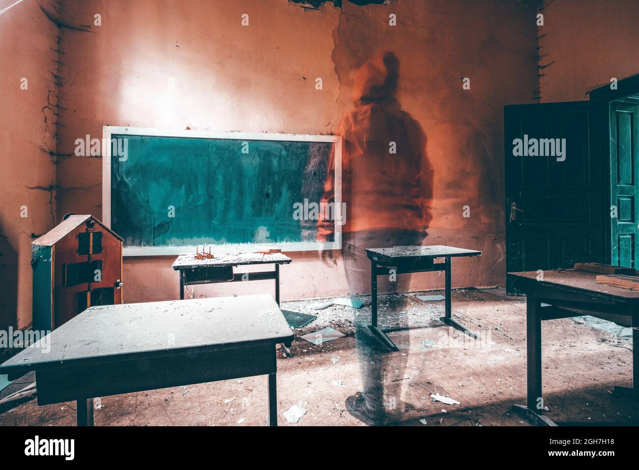 Spooky ghost walking in an abandoned classroom Stock Photo - Alamy