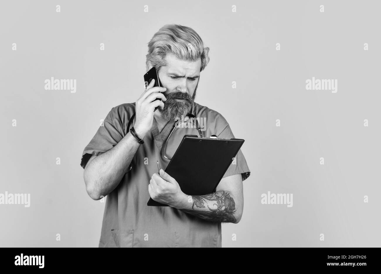 Improve your health. Doctor checking medical record. hospital ...