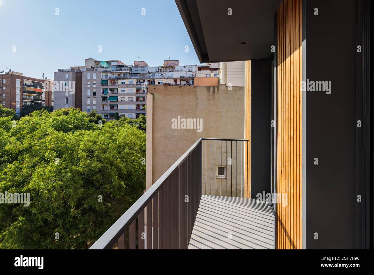 View of the buildings and trees from a balcony in modern building Stock ...
