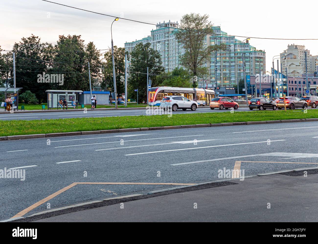 Traffic cars on one of the streets in Moscow (summer evening), Russia ...