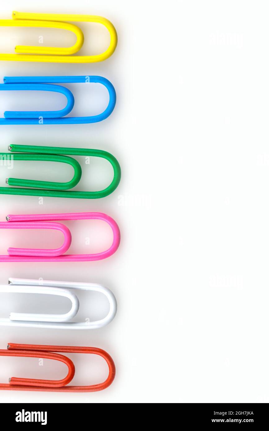 Colorful paperclips isolated on white background Stock Photo - Alamy