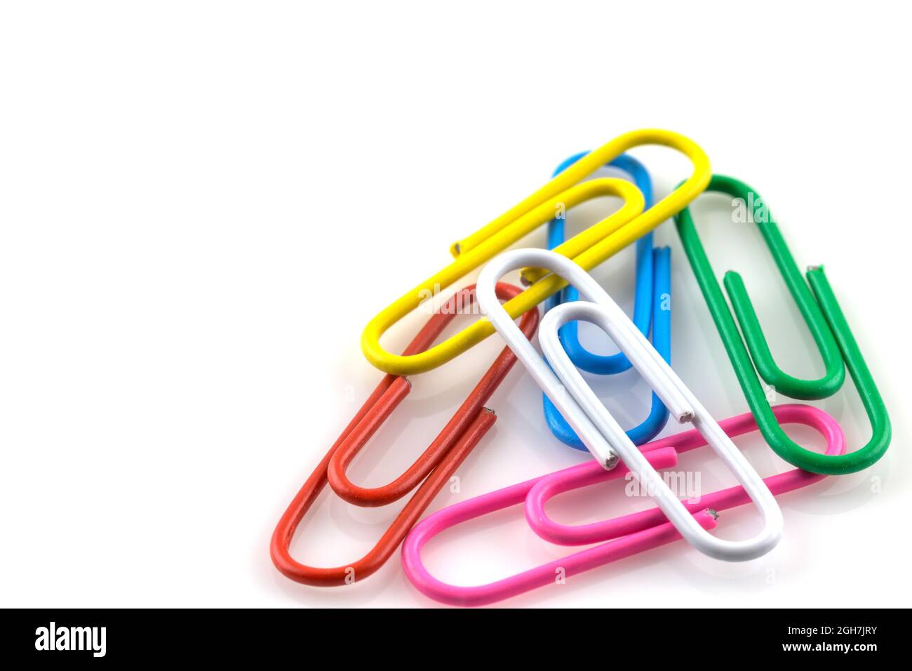 Colorful paperclips isolated on white background Stock Photo - Alamy