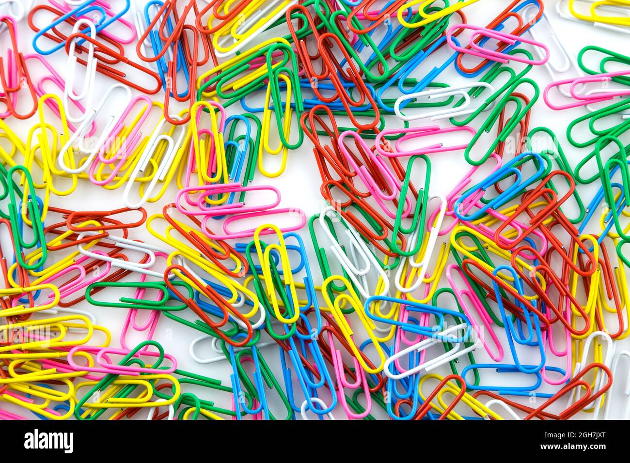 Colorful paperclips isolated on white background Stock Photo - Alamy