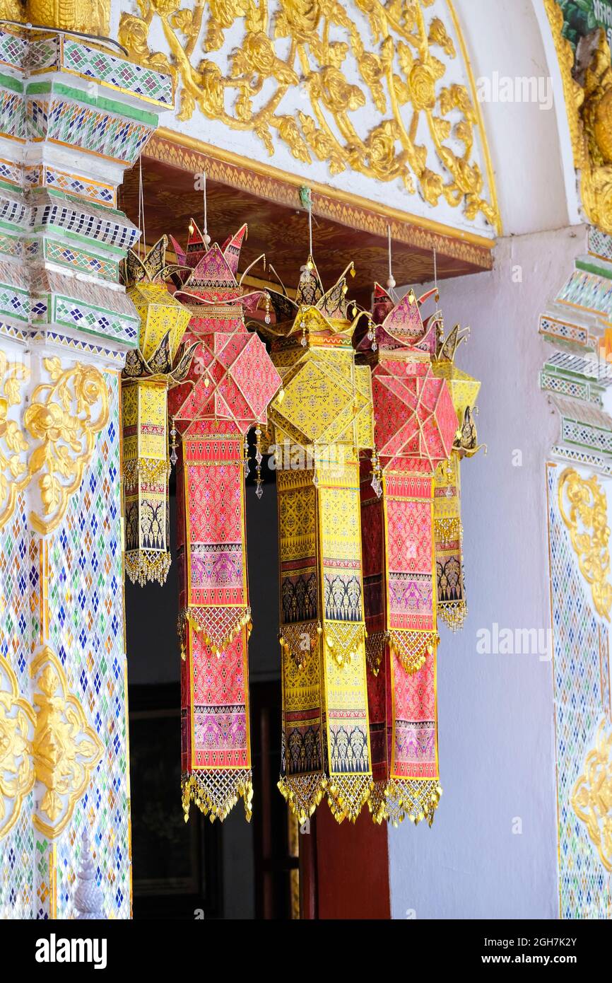 A group of colorful traditional hand painted silk cloth lanterns ...