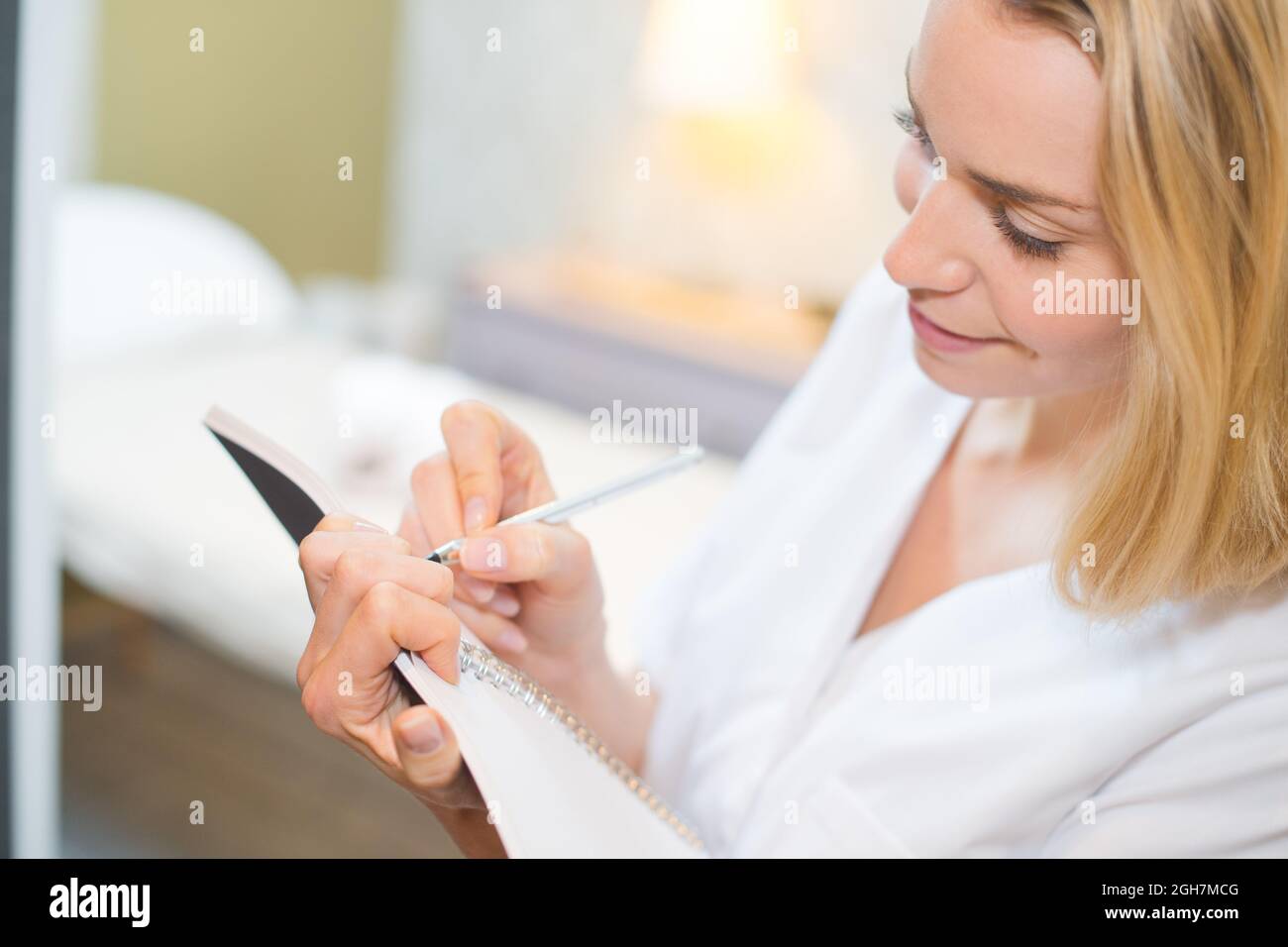 female doctor filling patient registration form Stock Photo - Alamy