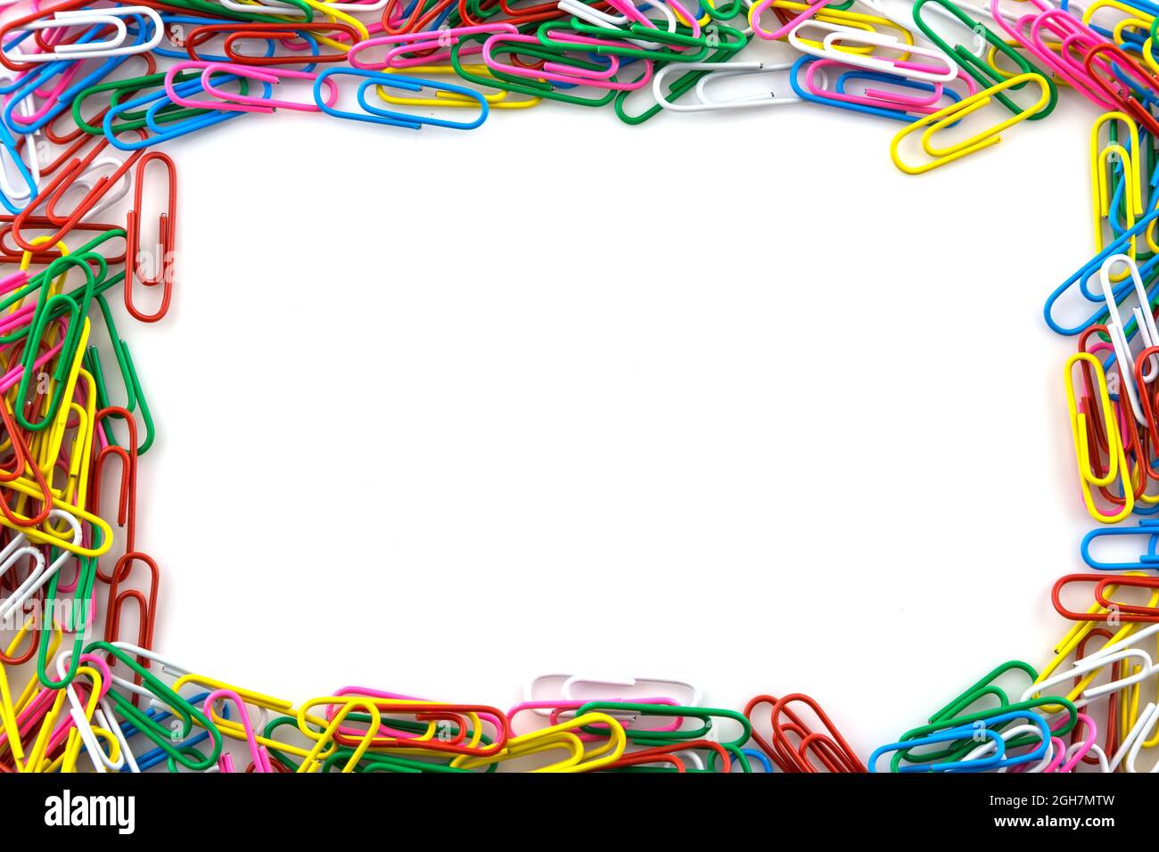 Colorful paperclips isolated on white background Stock Photo - Alamy