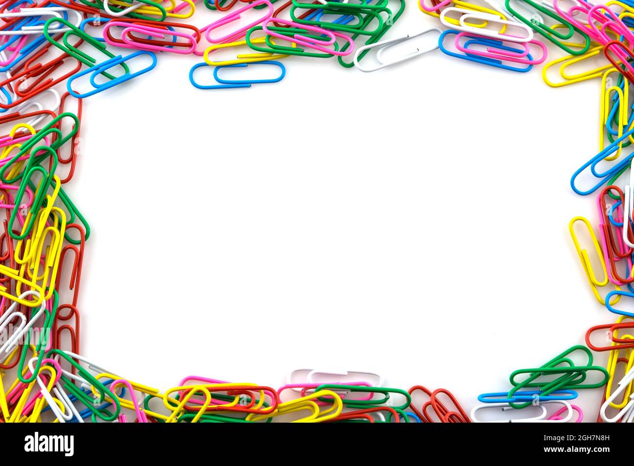 Colorful paperclips isolated on white background Stock Photo - Alamy