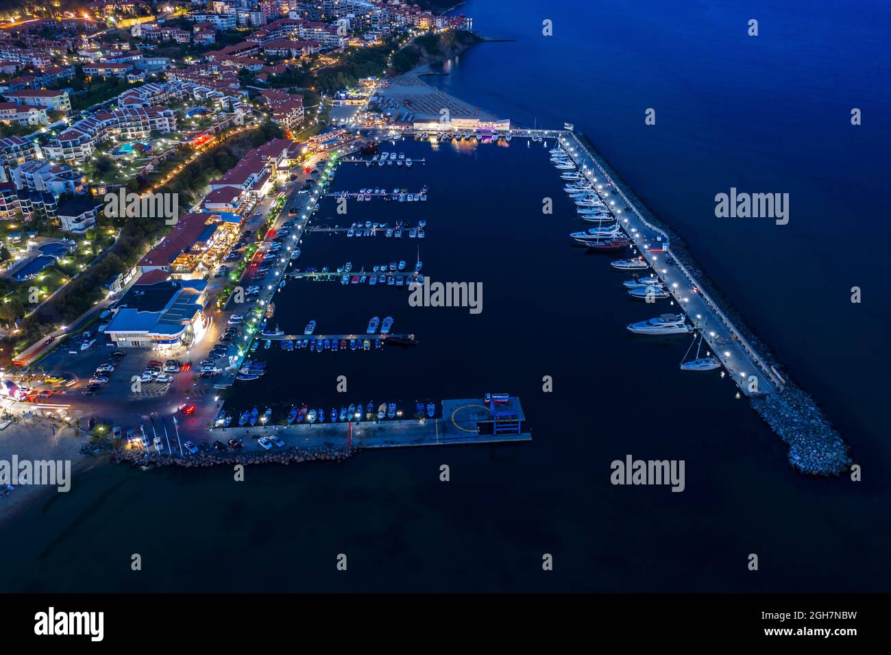 Aerial view to yacht marina at night Stock Photo - Alamy