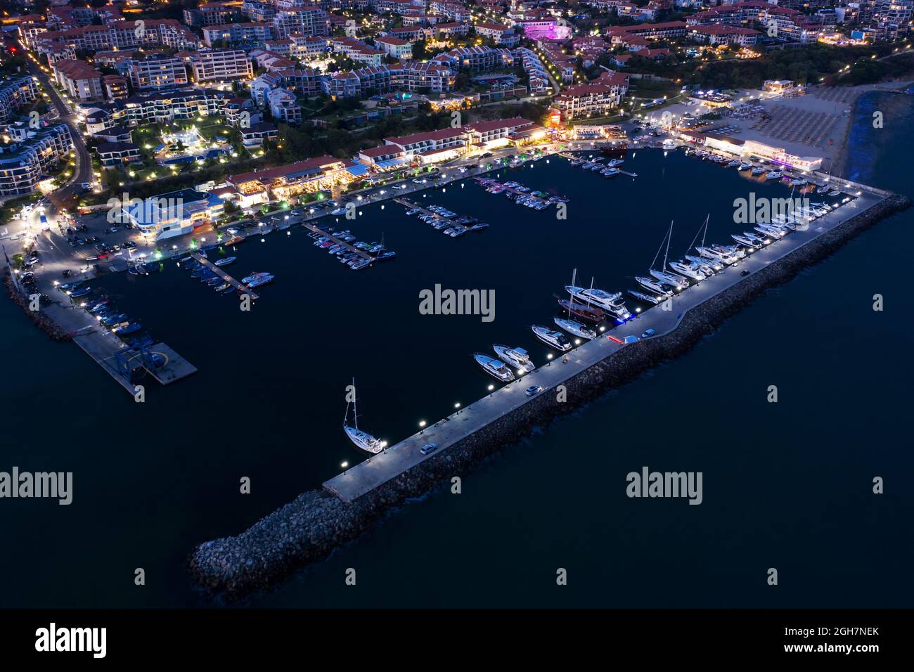 Aerial view to yacht marina at night Stock Photo - Alamy
