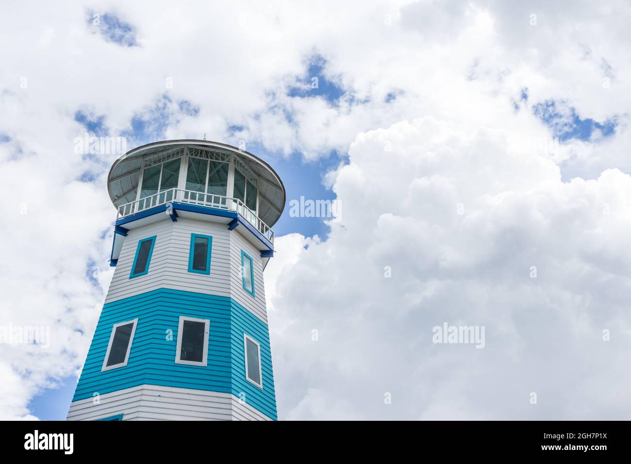 Blue lighthouse on bluesky and cloud Stock Photo - Alamy