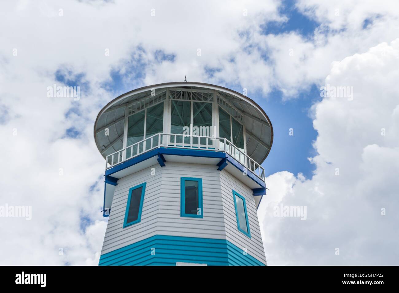 Blue lighthouse on bluesky and cloud Stock Photo - Alamy
