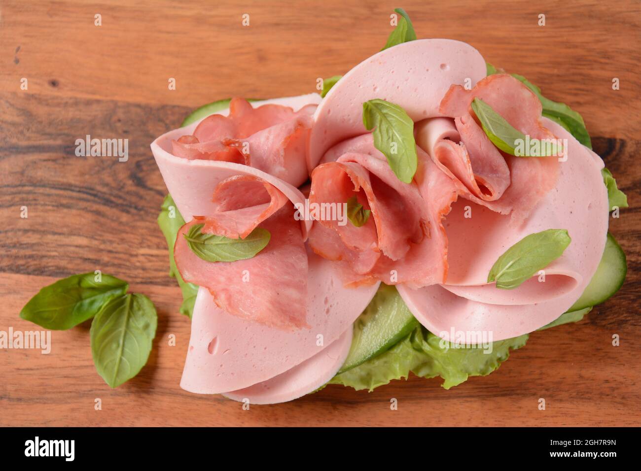 Open ham Sandwich with cucumbers, basil, and a crusty slice of rye ...