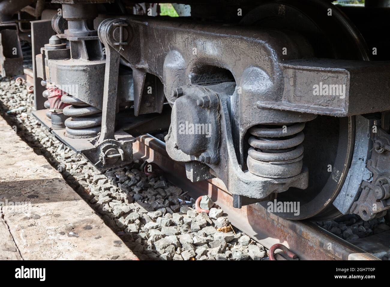 closeup wheel break and suspension system of diesel train Stock Photo ...