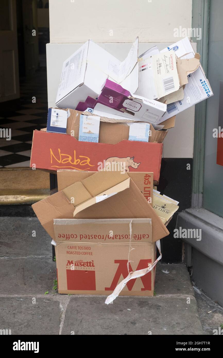 Pile of Cardboard boxes left for recycling Stock Photo - Alamy