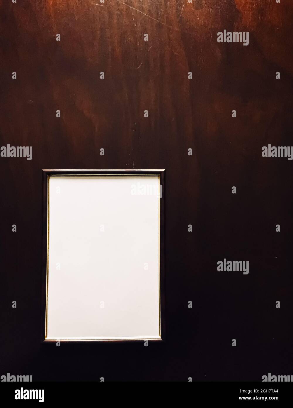 Blank picture frame on wooden background, luxury home decor and ...
