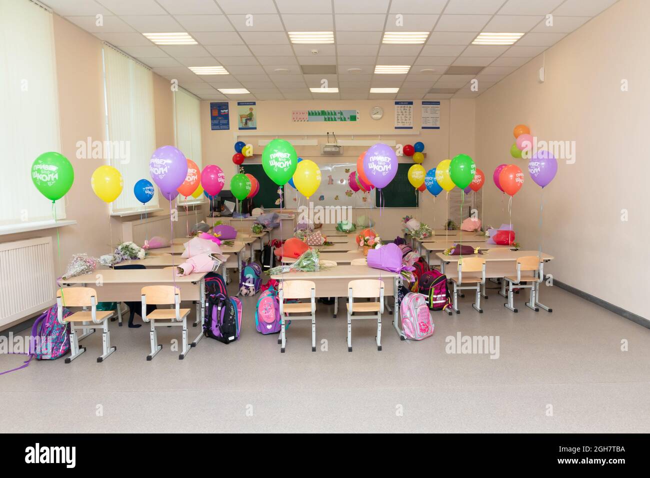 School bags on classroom table hi-res stock photography and images - Alamy