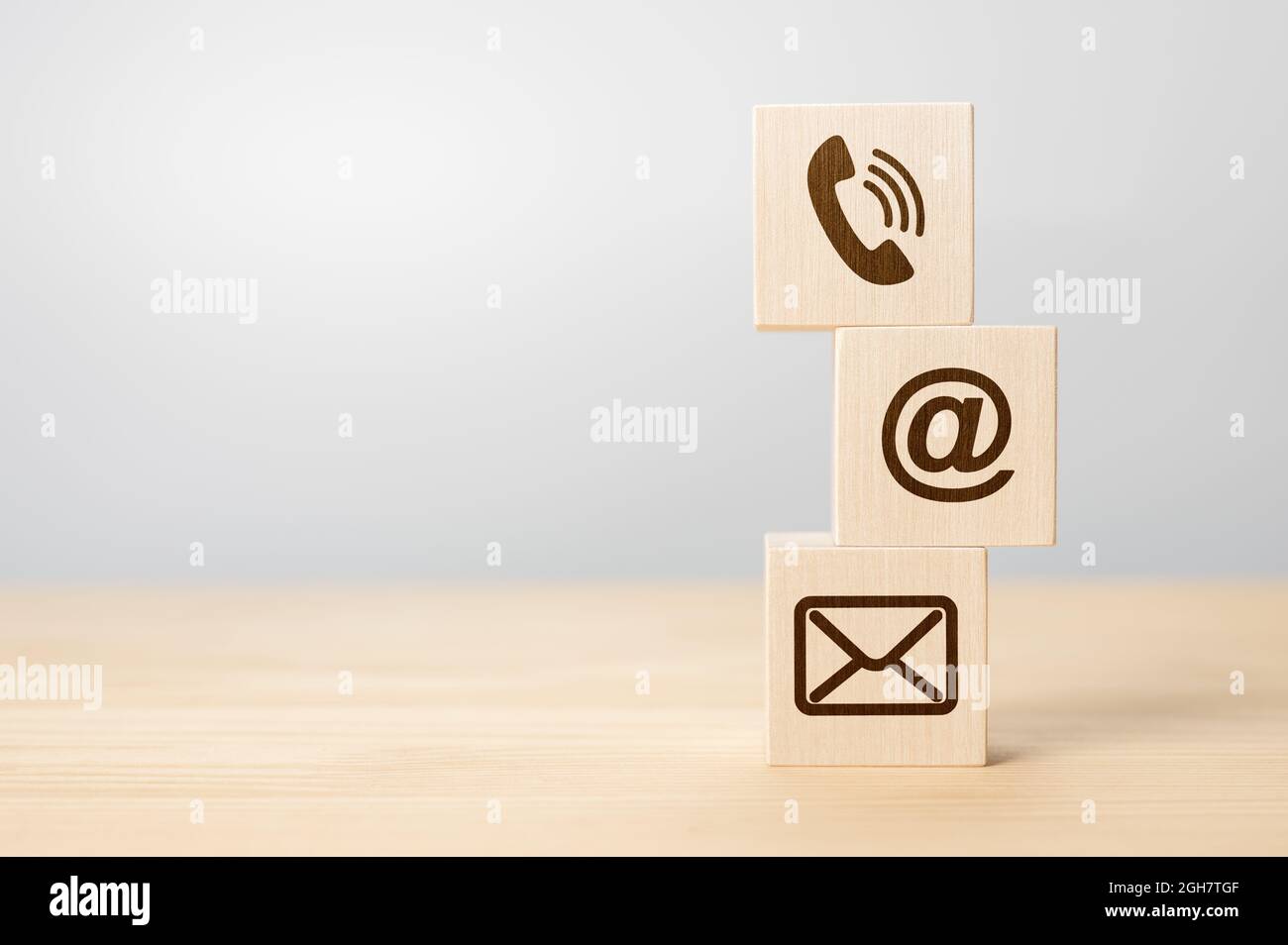 Contact us concept, Wood block symbol telephone, mail, and address on ...