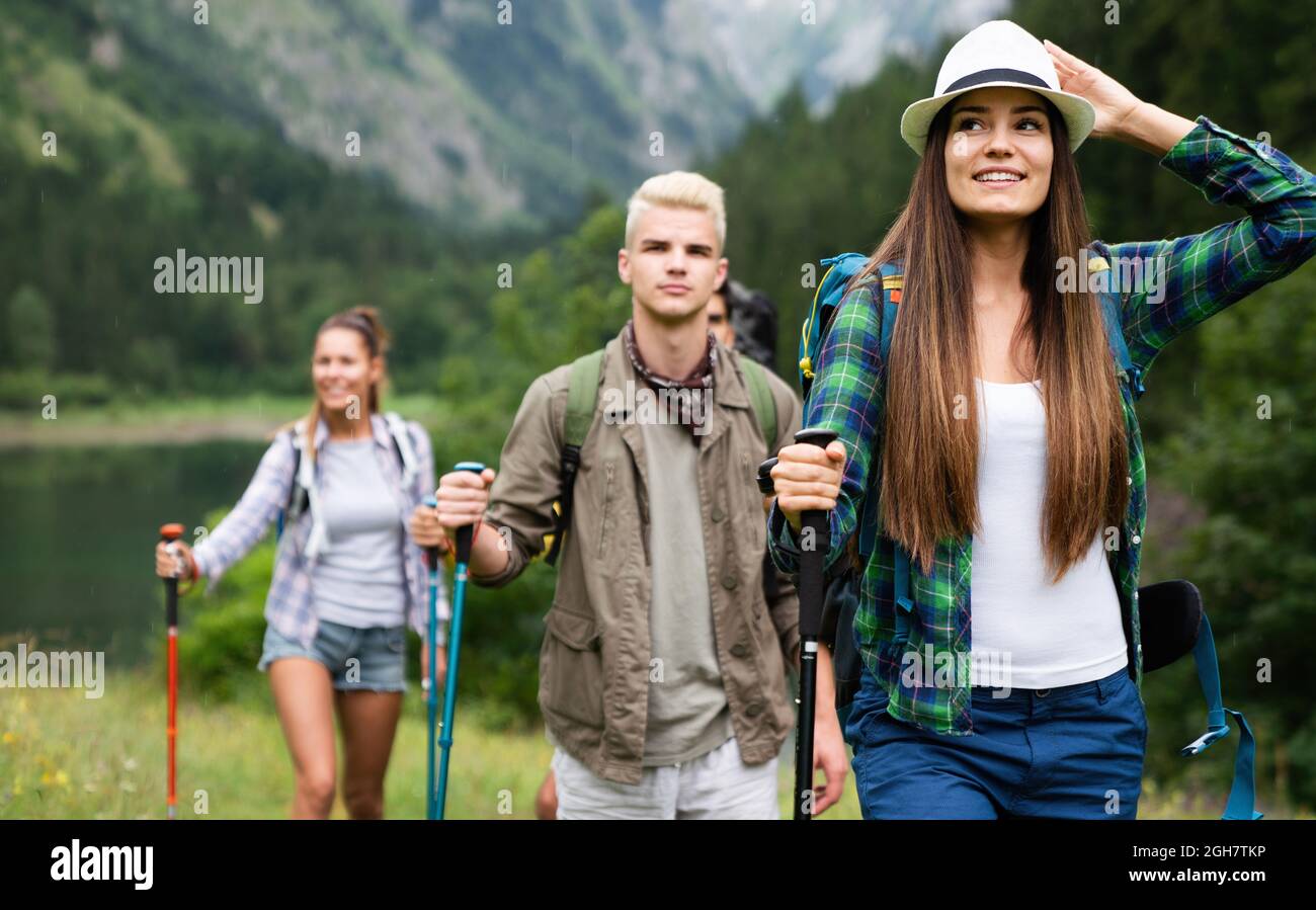 Group of happy friends enjoying outdoor activity together Stock Photo ...