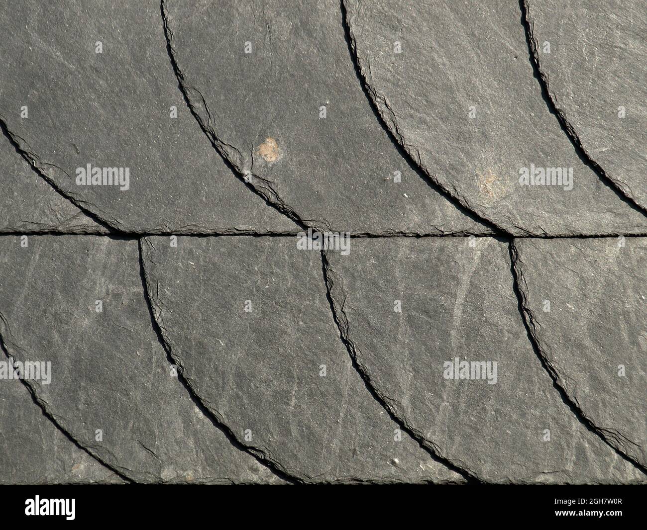slate plates on a facade. Closeup Stock Photo - Alamy