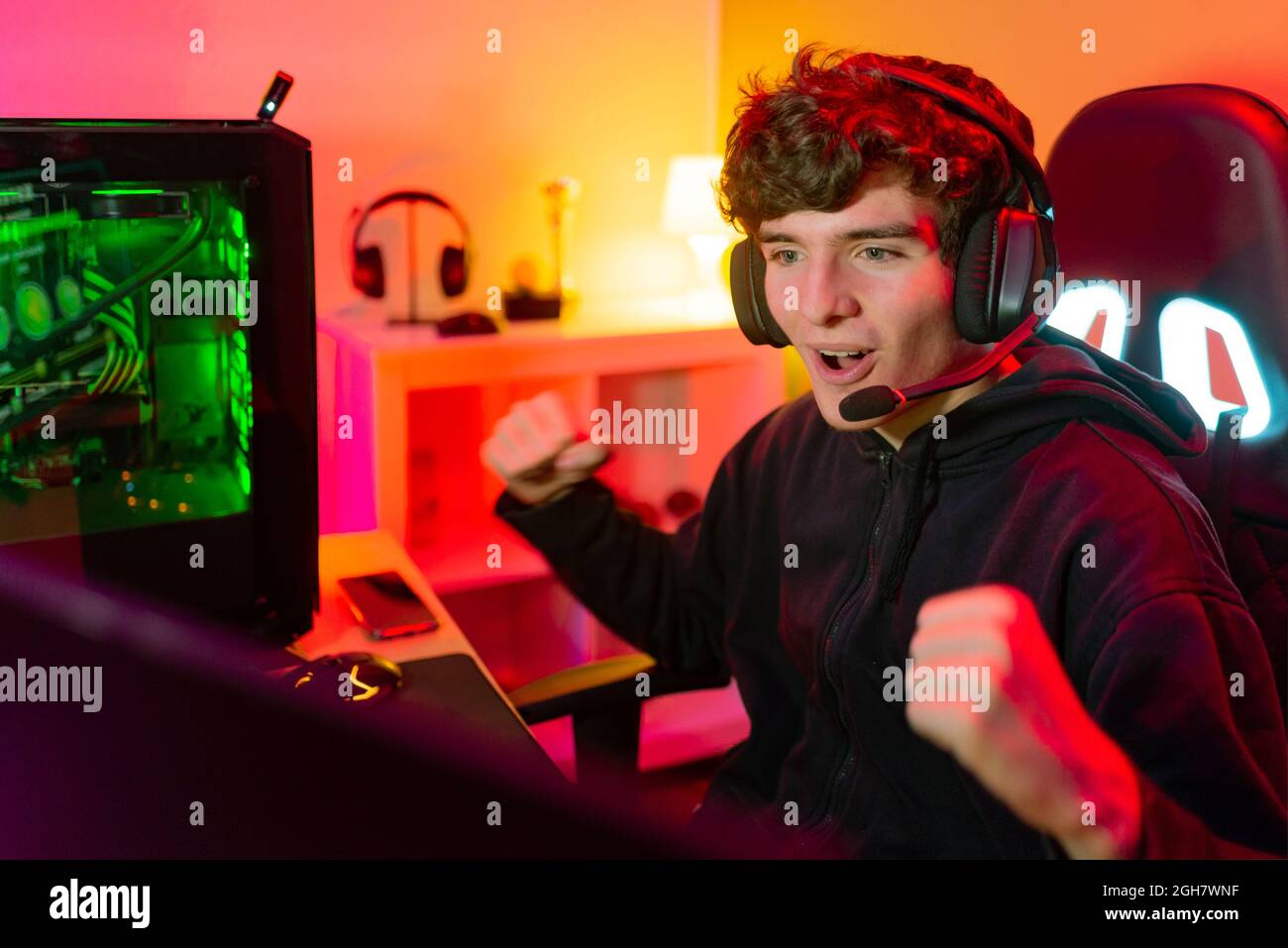 Excited by computer game hi-res stock photography and images - Alamy