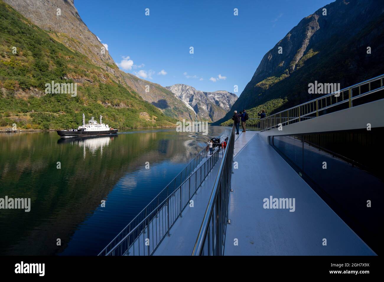 Tourists on the deck of the Future of the Fjords Sightseeing Vessel as ...