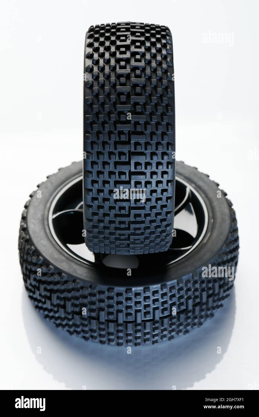 Pair of new offroad tires stack isolated on white studio background ...