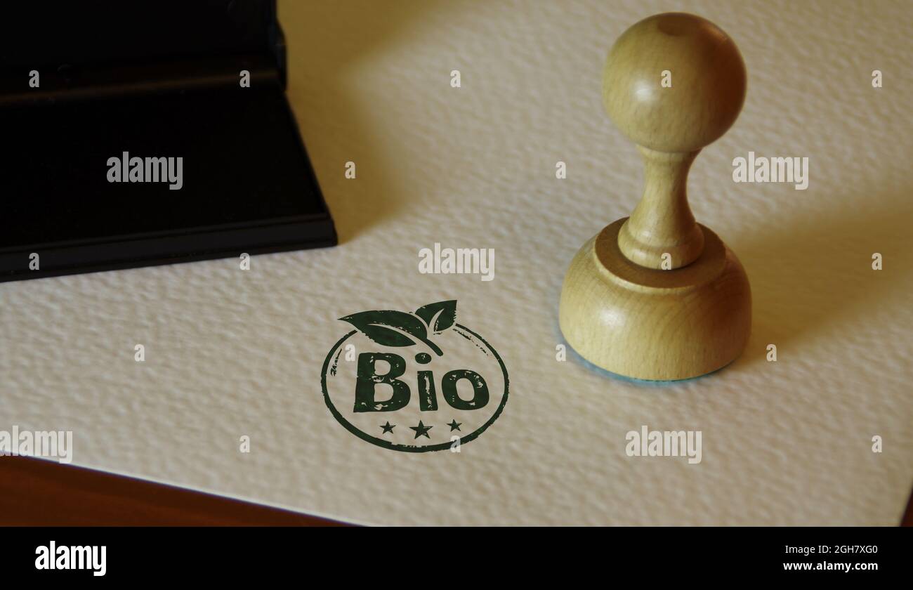 Bio stamp and stamping hand. Ecology, environment, natural food ...