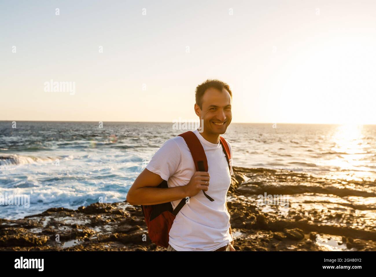 Man alone enjoying sea and mountains view Travel lifestyle adventure ...