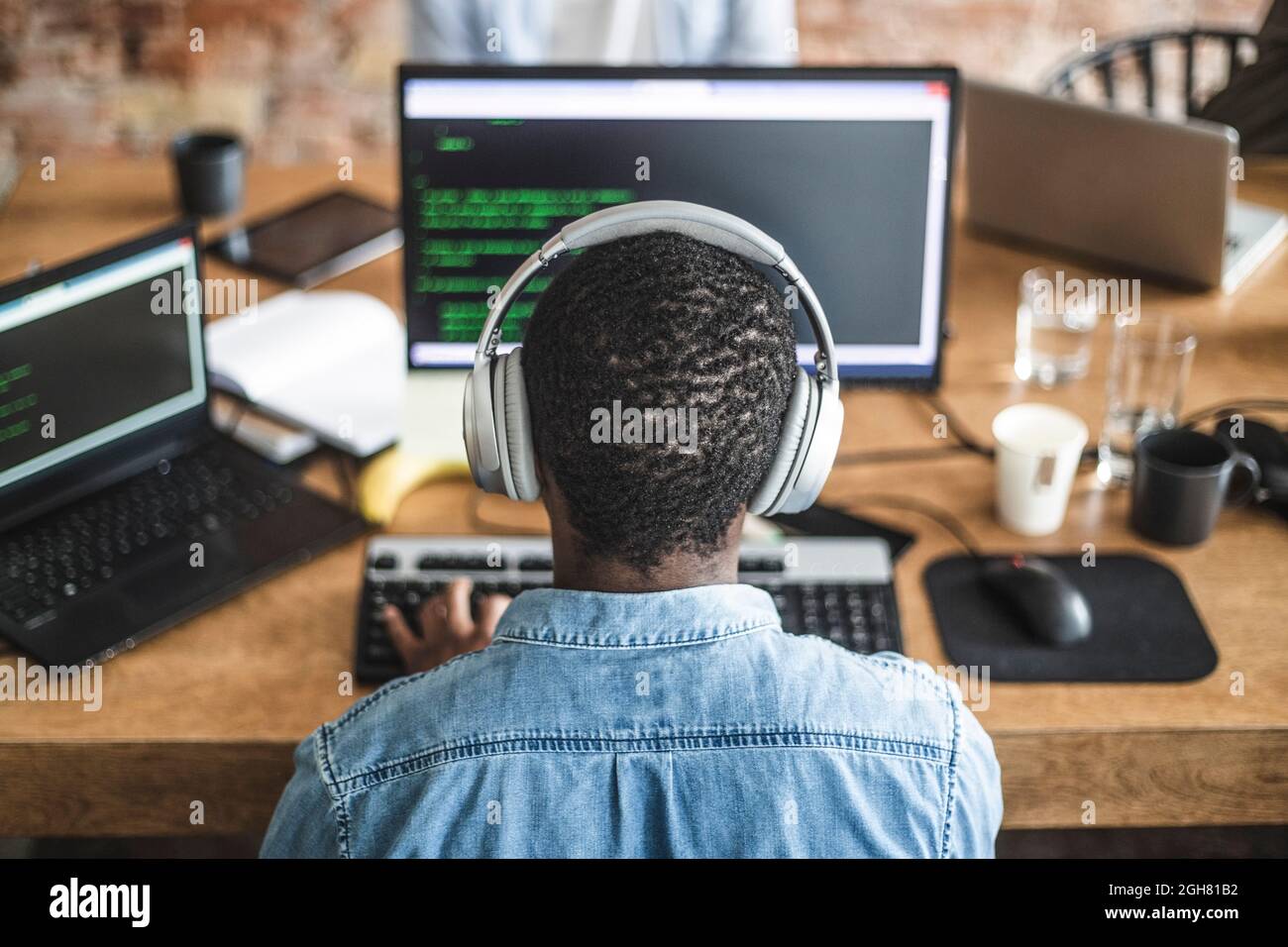 African american male programmer working hi-res stock photography and ...