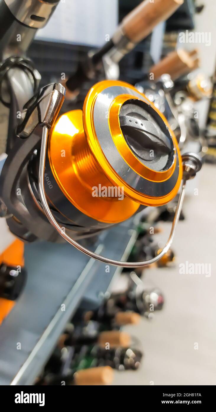 Fishing rod yellow reel hi-res stock photography and images - Alamy