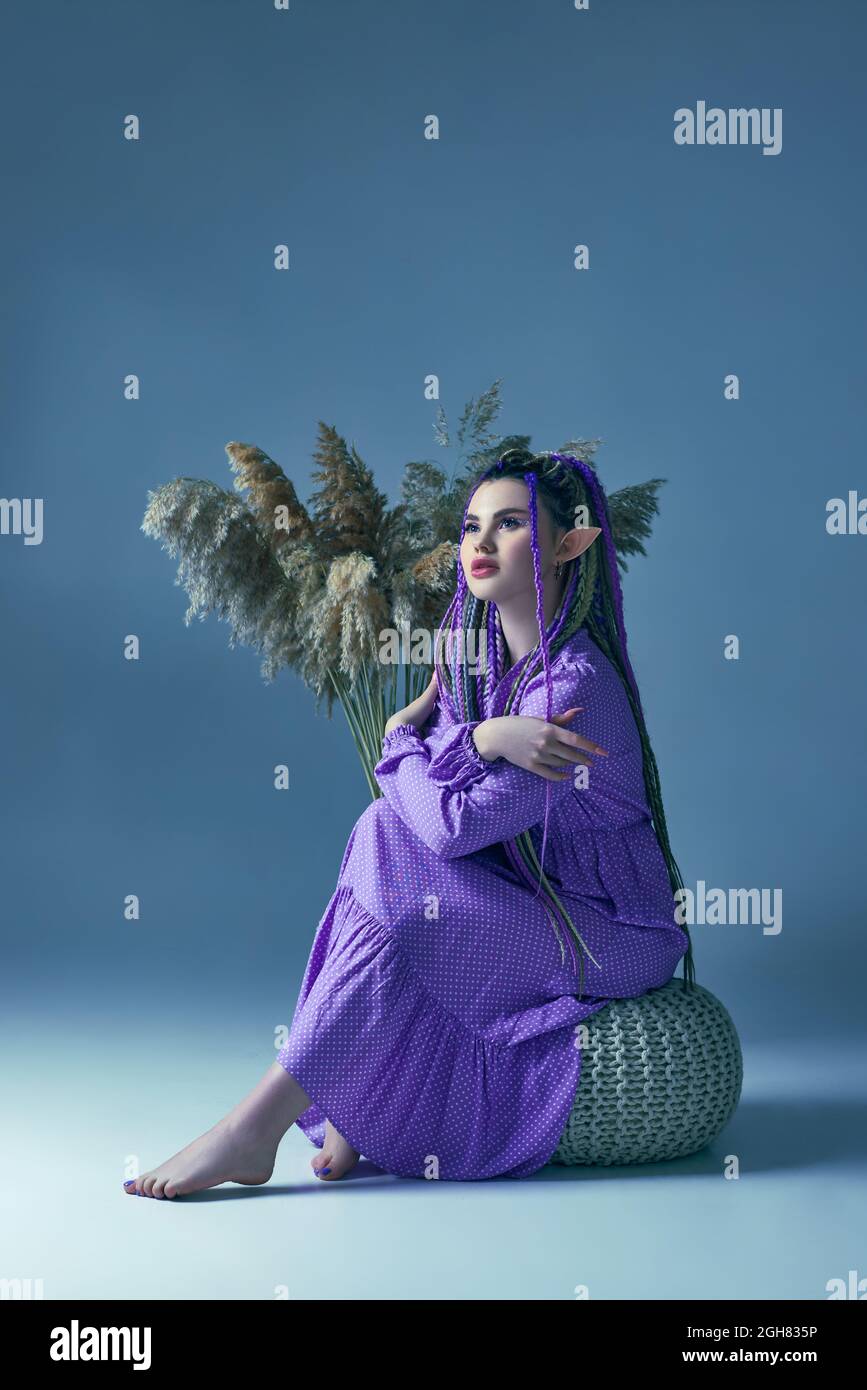 young and beautiful woman elf posing at camera Stock Photo - Alamy