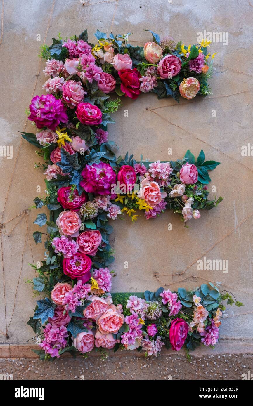 Floral Capital Letter E On Wall of Building Stock Photo - Alamy