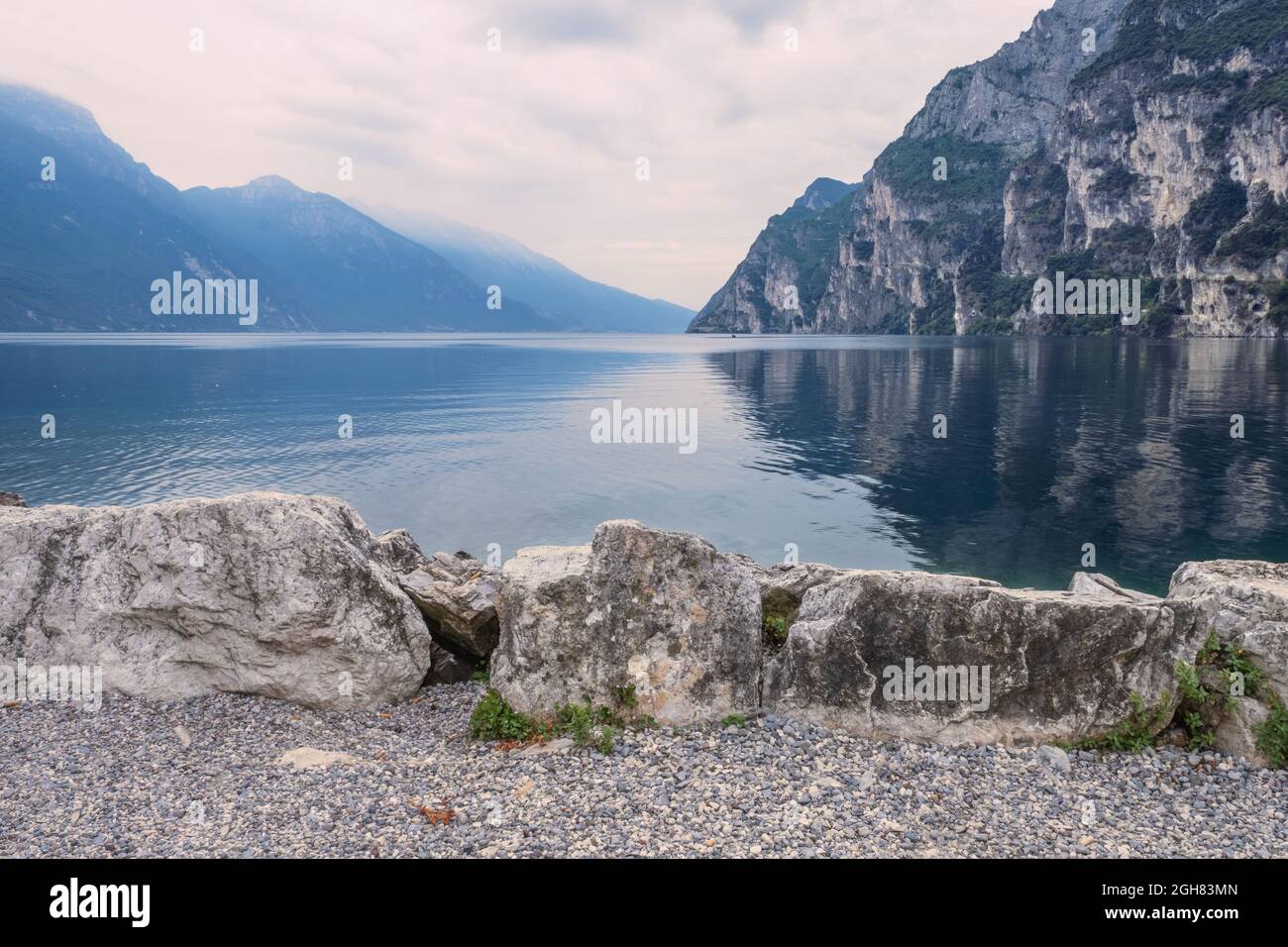 Lake Garda in Italy with stone shore, view of the water surface and ...
