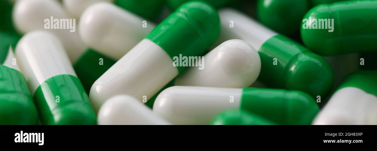 Large number of pharmaceutical white-green tablets closeup Stock Photo ...