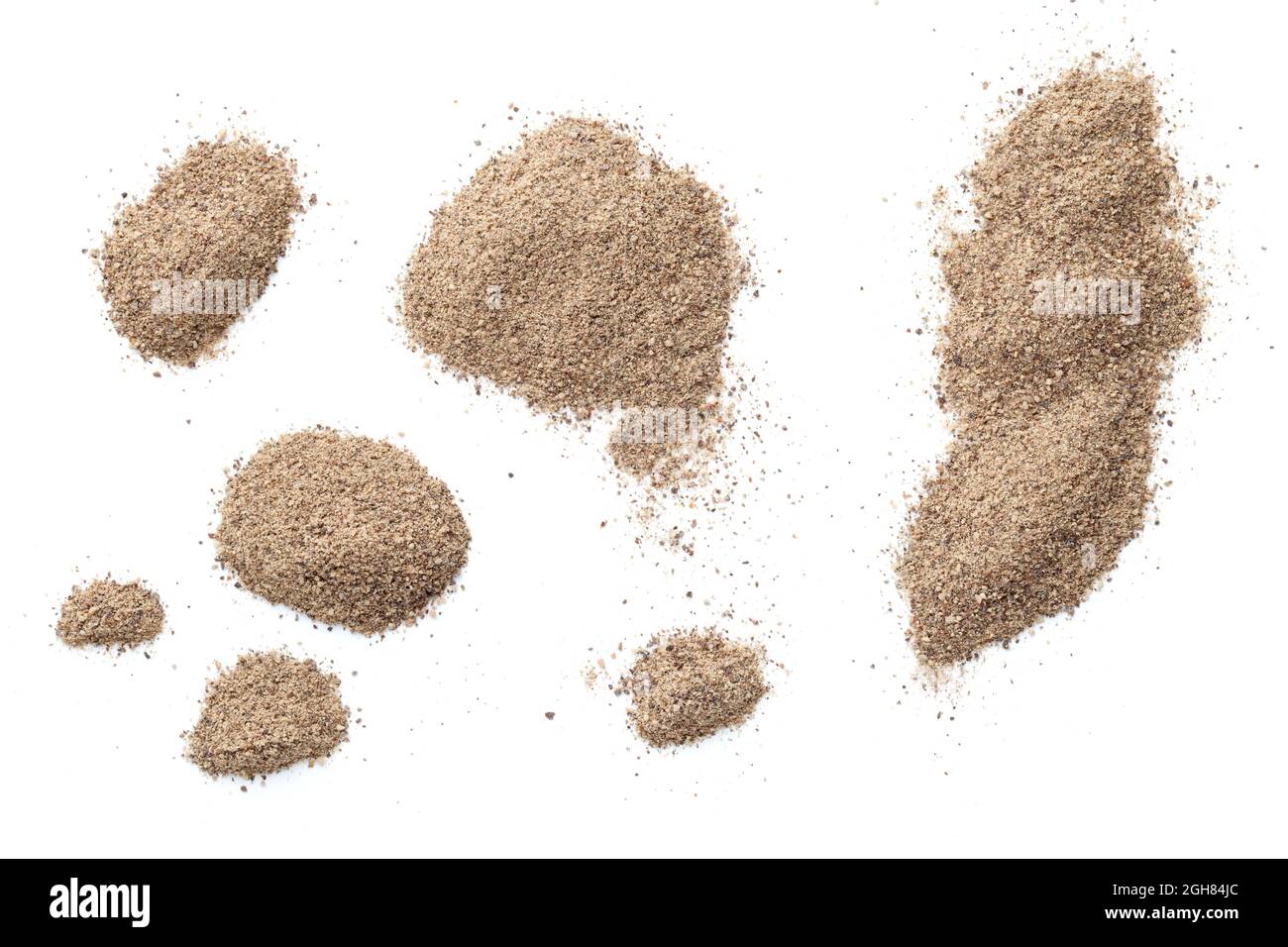 Ground black pepper isolated on white background. Flat lay, top view ...